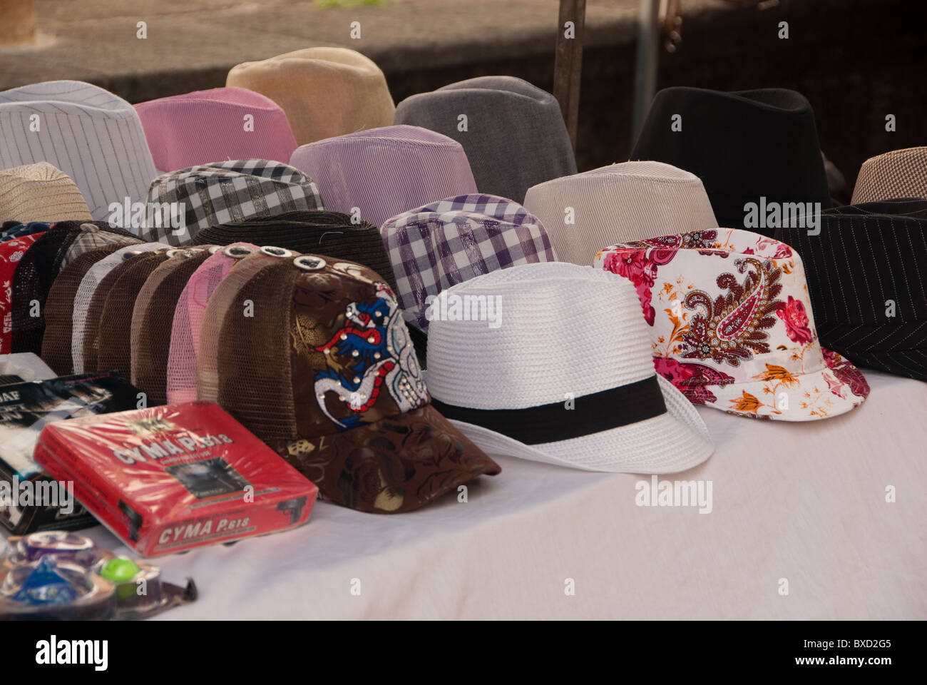 Hats on Spanish market stall Stock Photo - Alamy