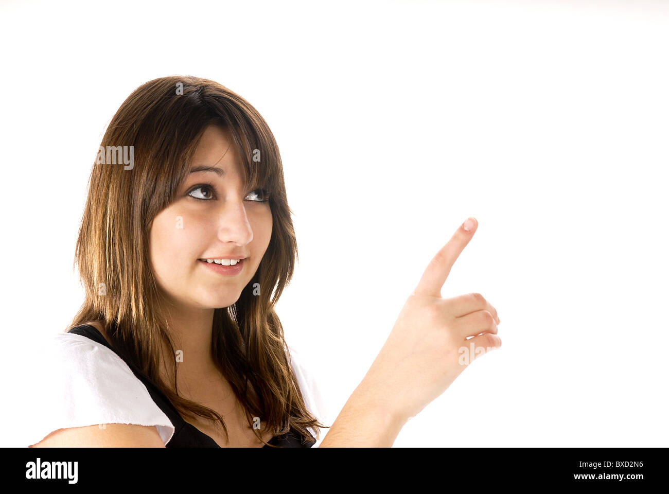 Young woman pointing with her finger Stock Photo - Alamy