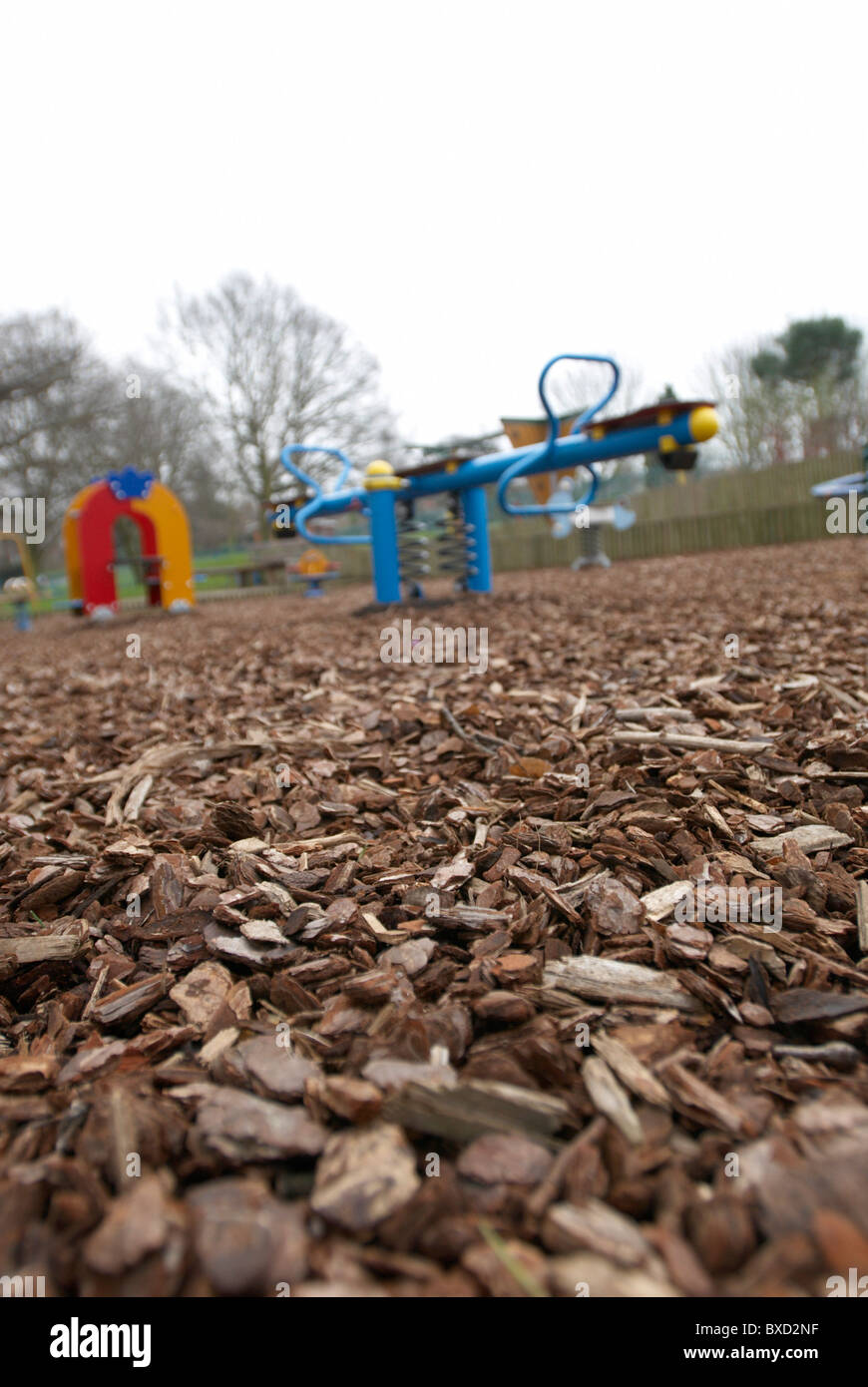 Playground surfacing with bark-based pine chipboards made of recycled ...