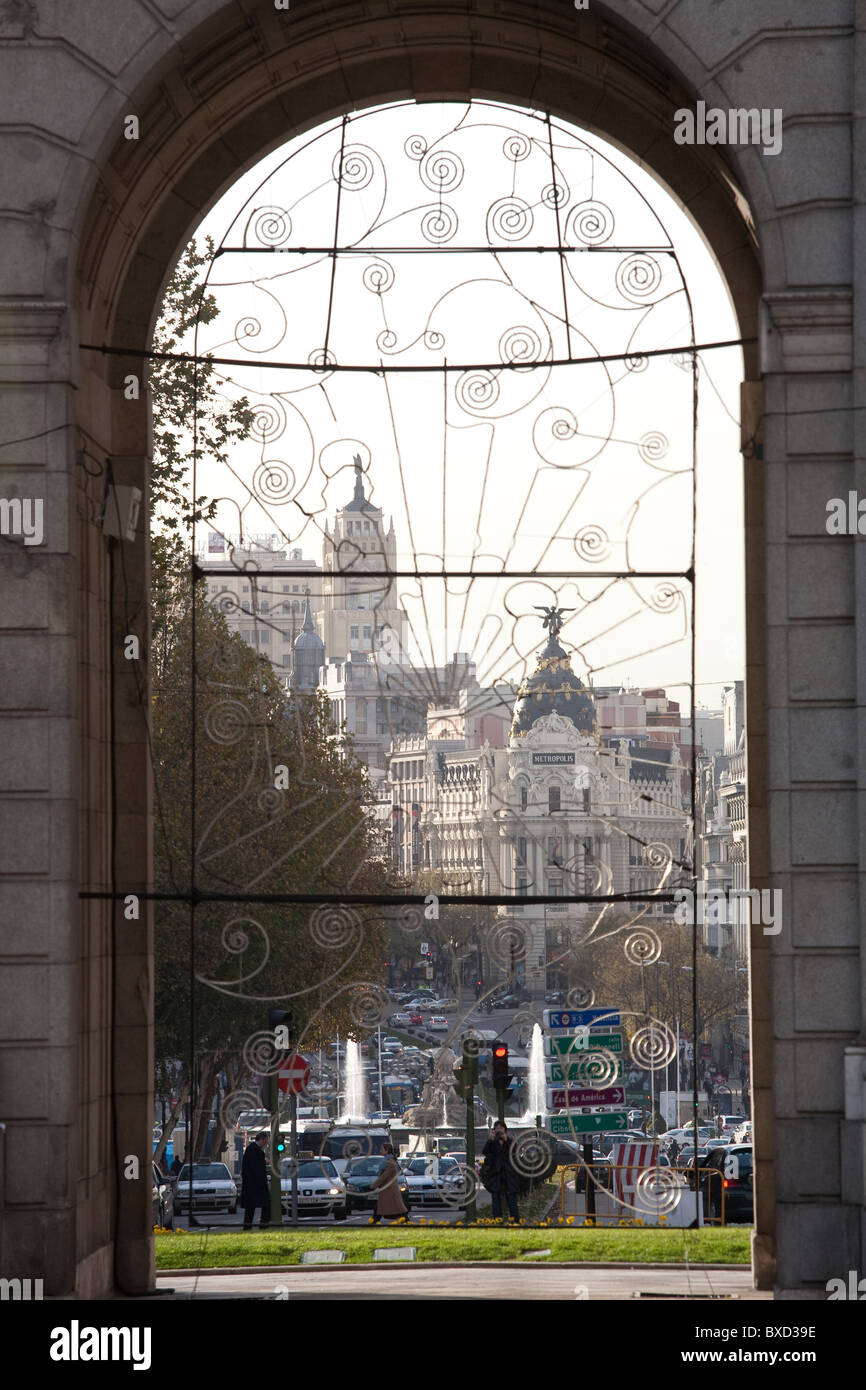 Metropolis Building photographed through the Puerta de Alcala monument ...