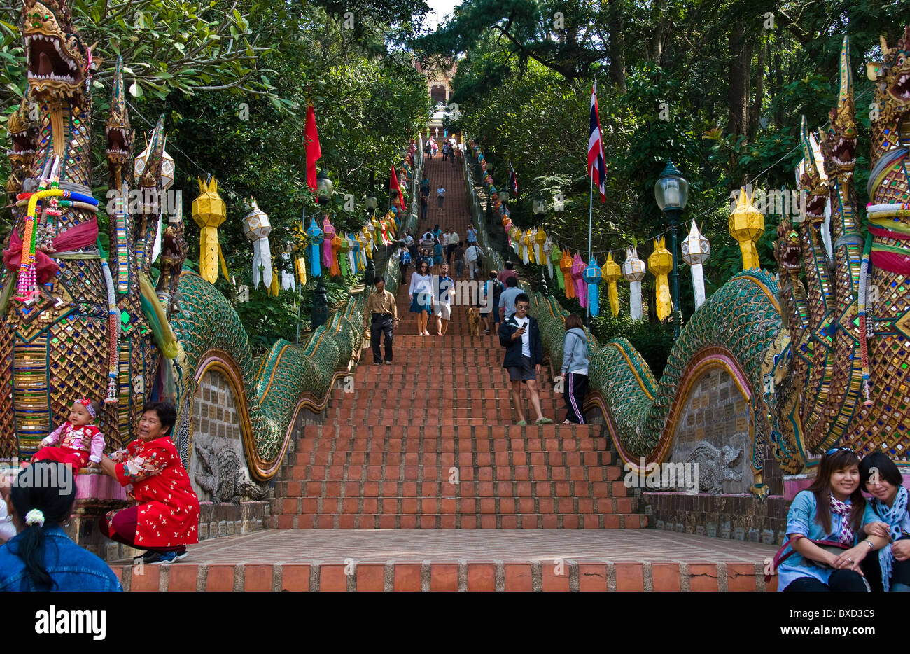 People climbing up and down the 300 steps at Wat Phra That Doi Suthep ...