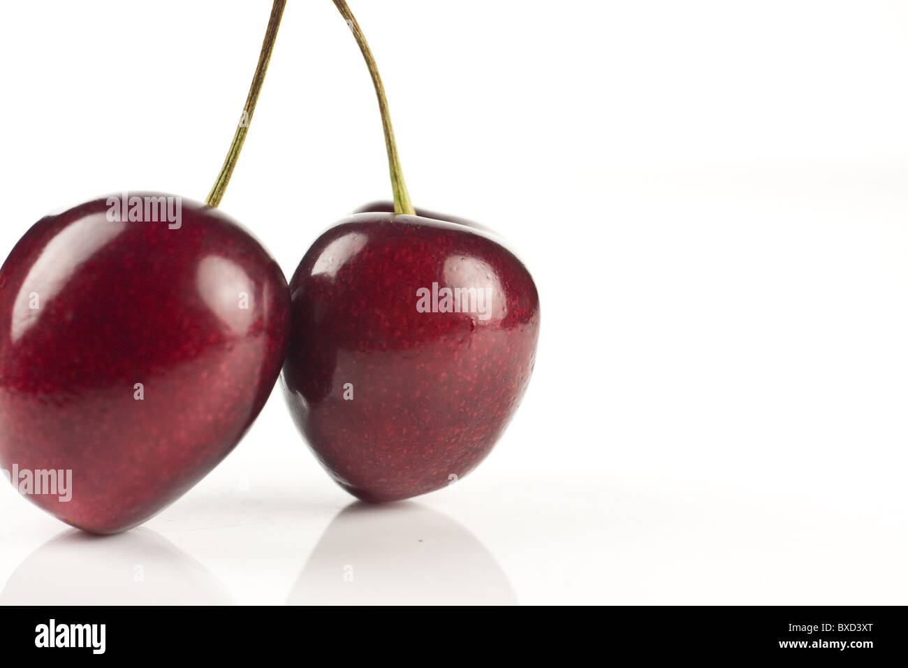 Ripe red cherries on cherry hi-res stock photography and images - Alamy
