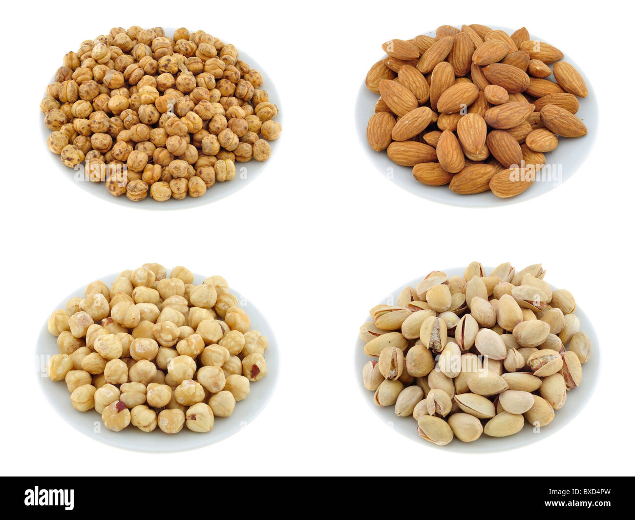 Nuts, Seeds & Appetizers on white plate Stock Photo - Alamy