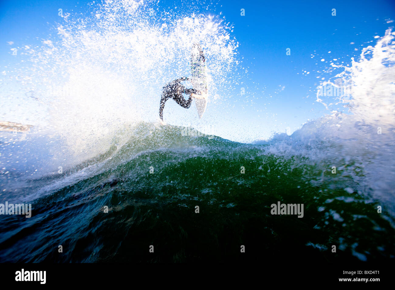 A skilled male surfer launches an air Stock Photo - Alamy