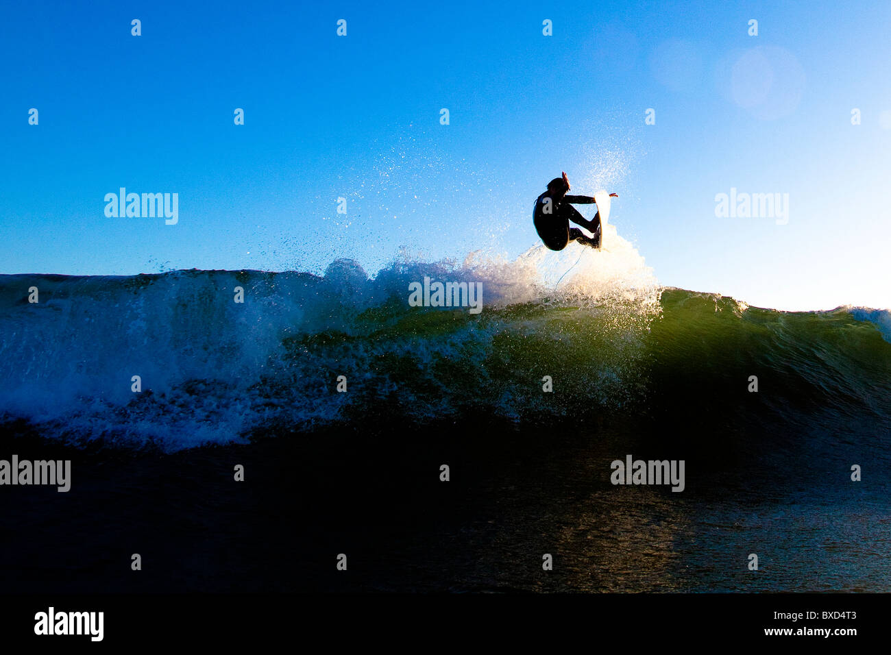 A skilled male surfer launches an air Stock Photo - Alamy