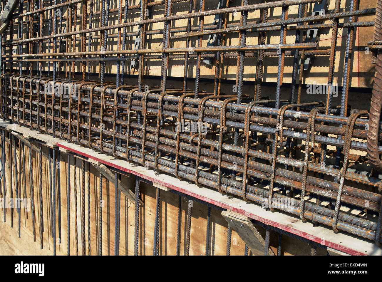 Steel rods put into place for concrete pouring on the construction of a ...