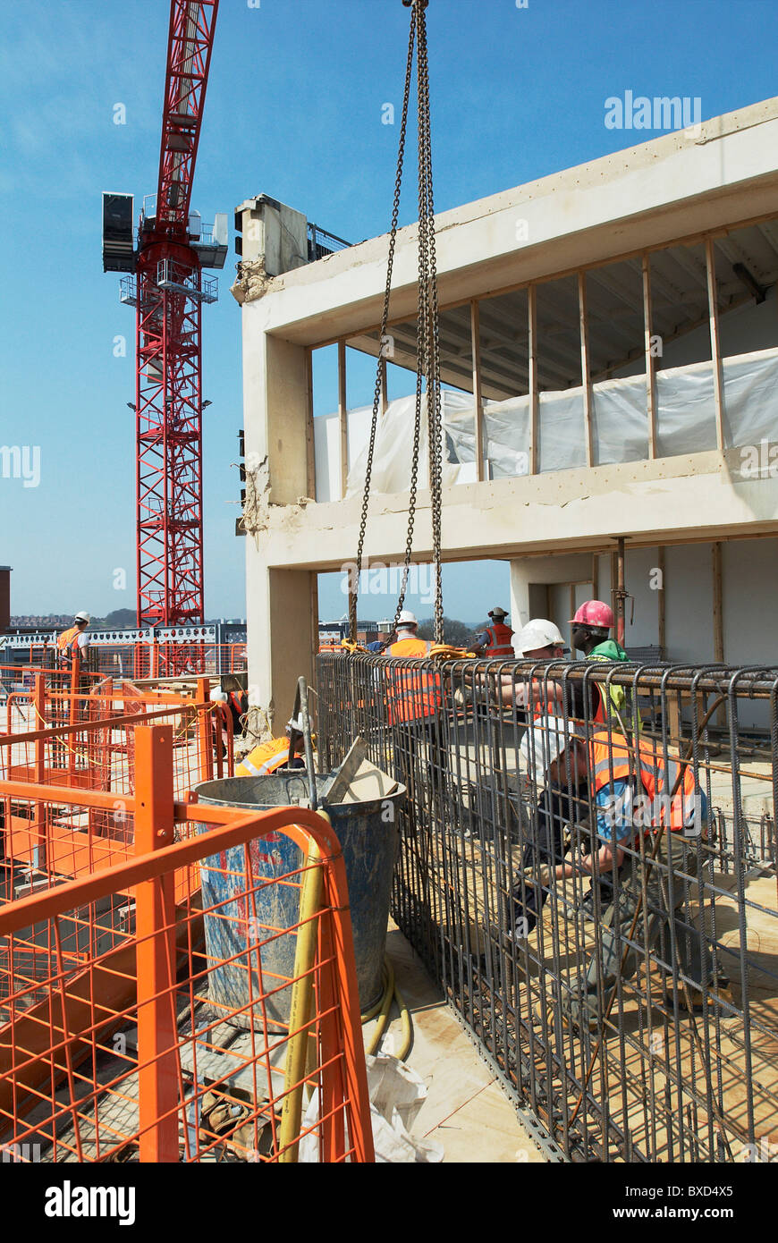 Steel rods put into place for concrete on the construction of a multi ...