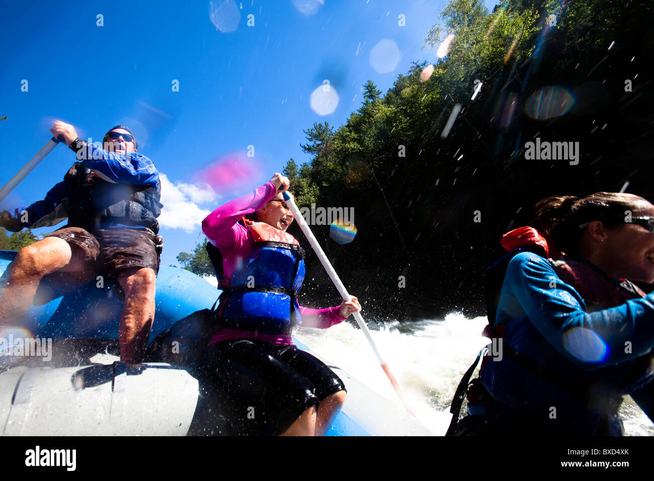 Young men and women in raft hi-res stock photography and images - Alamy