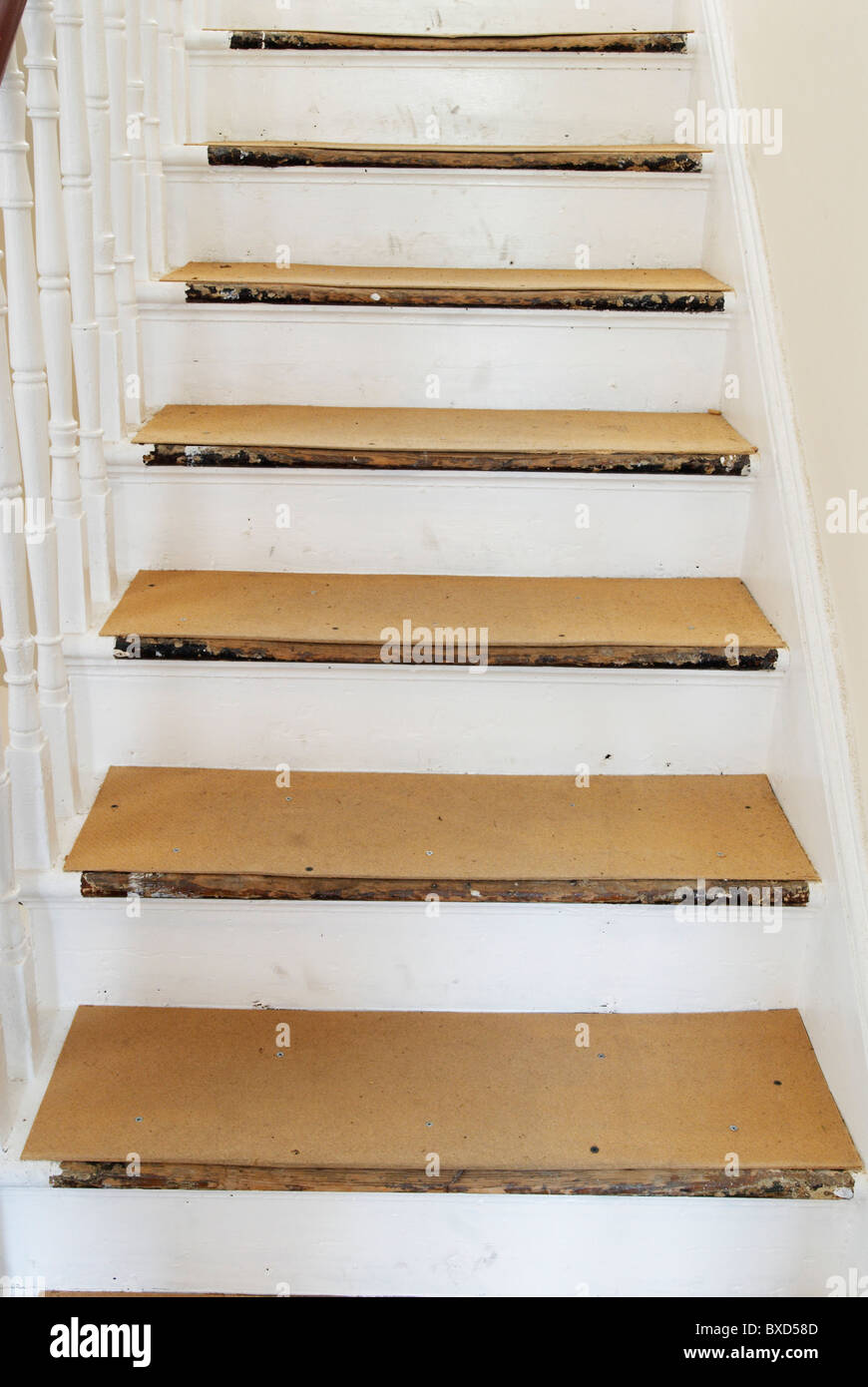 Insulation visible on stairs Stock Photo - Alamy