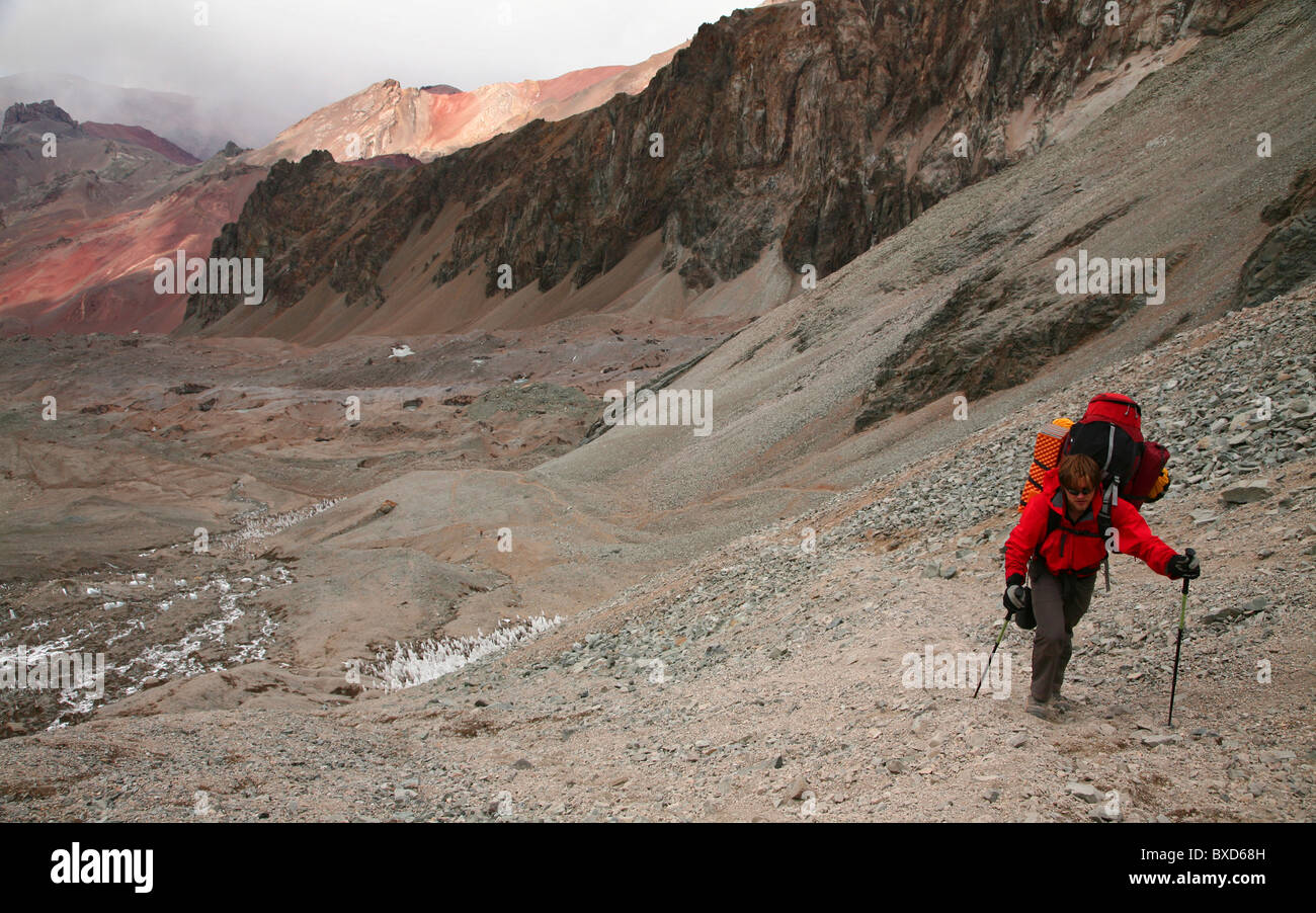 Mountaineer hauling a heavy load between camps on Aconcagua, Andes ...