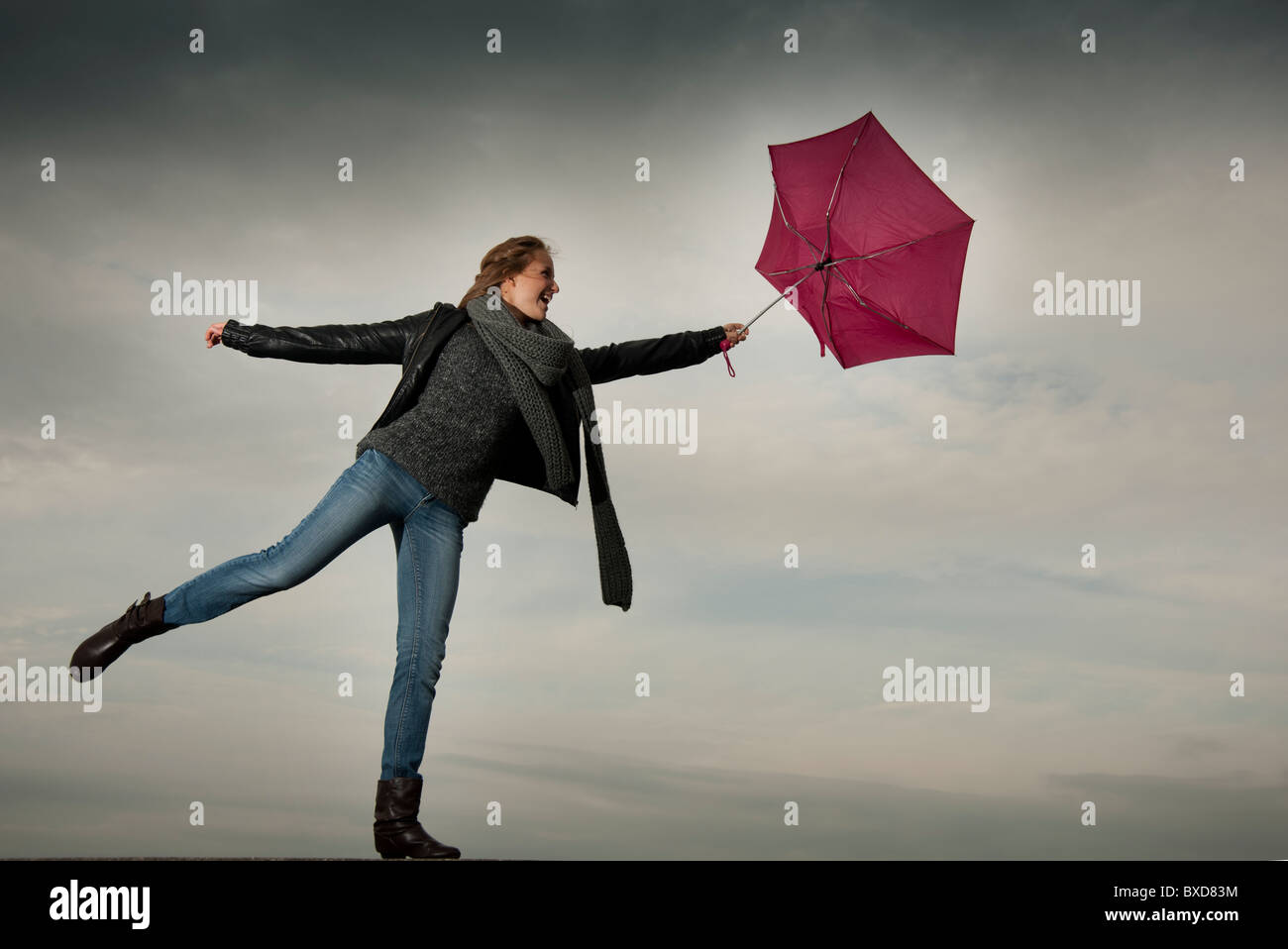woman fighting with an umbrella in the autumn, windy Stock Photo - Alamy