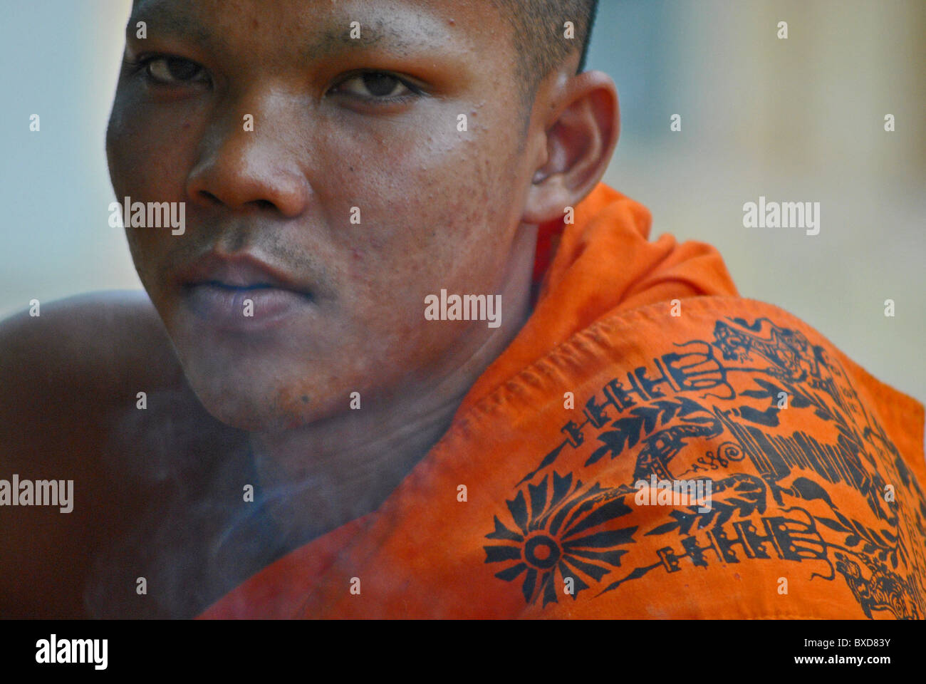 Buddhist monk with incense, Cambodia Stock Photo - Alamy
