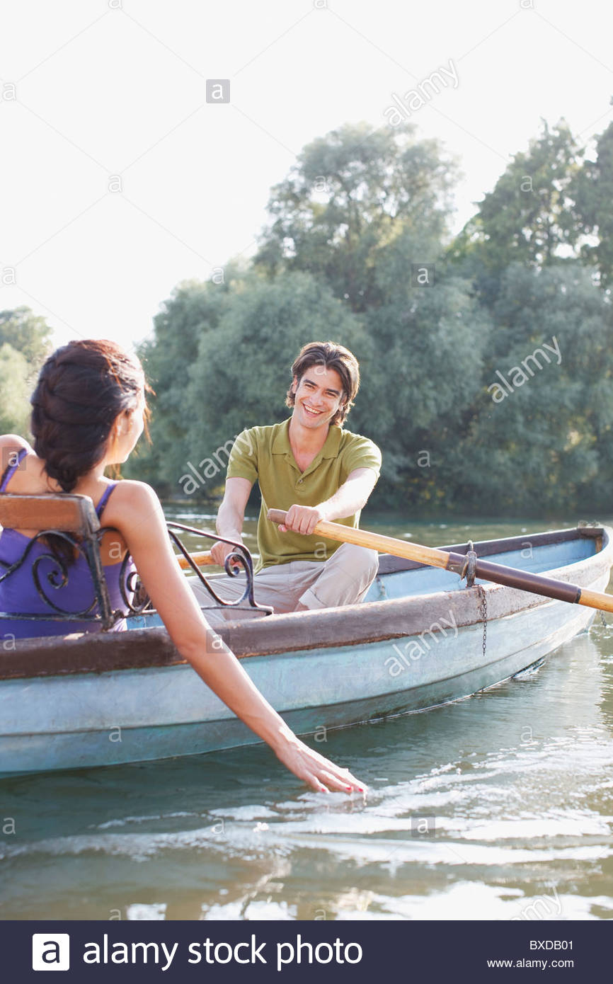 Couple In Rowing Boat On Stock Photos & Couple In Rowing Boat On Stock ...