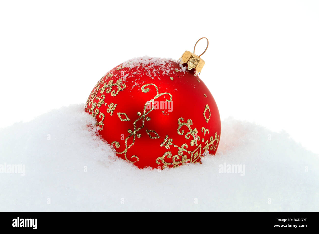 Red Christmas Ball in snowflakes Stock Photo - Alamy