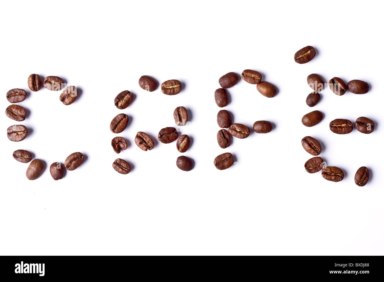 Lettes made of coffee beans spelling CAFE on white background Stock ...