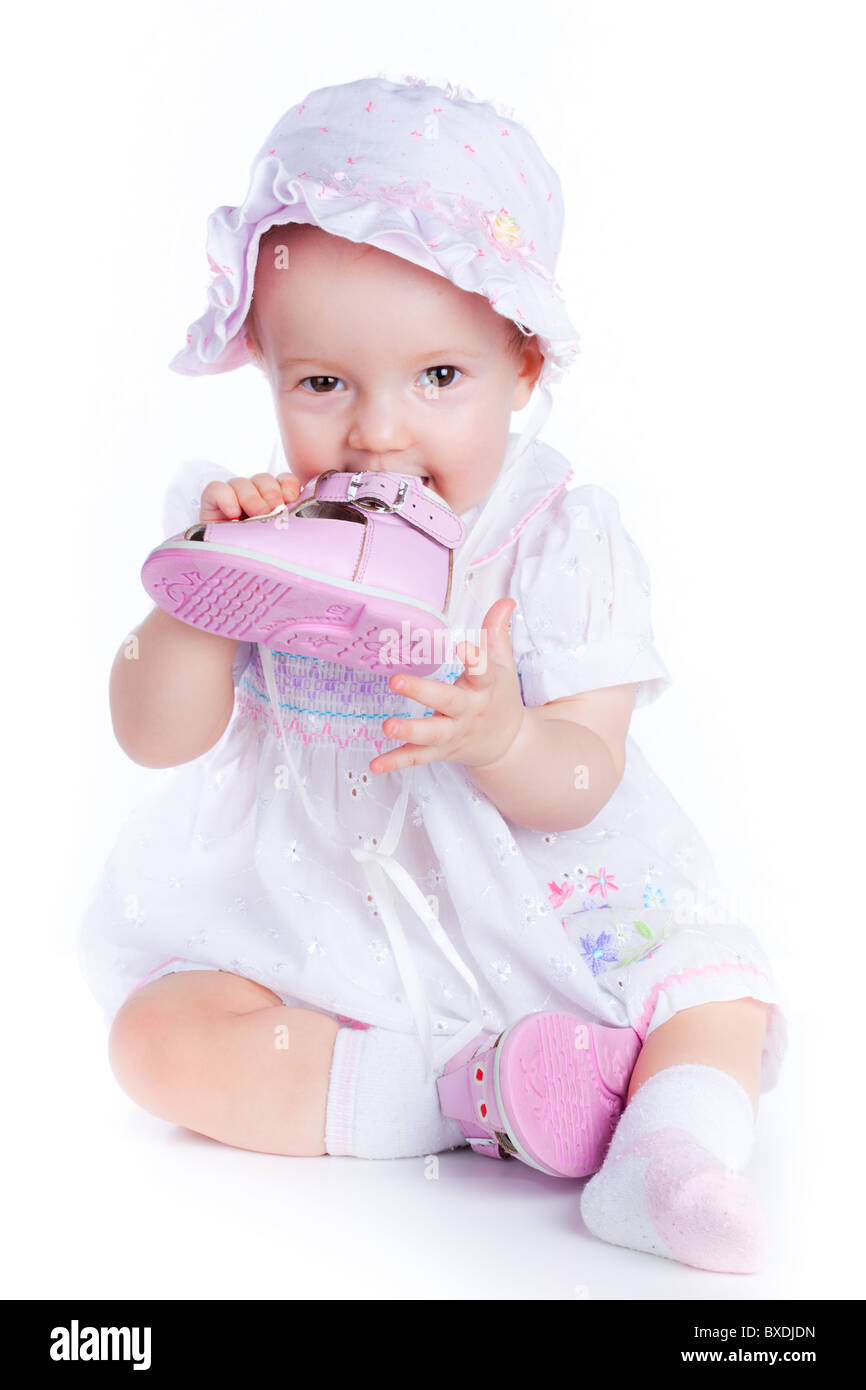 Baby in studio against a white background Stock Photo - Alamy