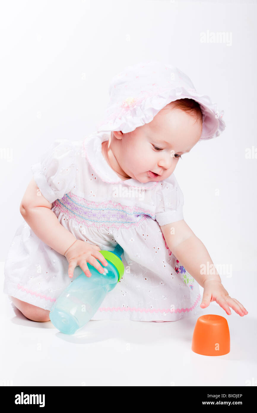 Baby in studio against a white background Stock Photo - Alamy