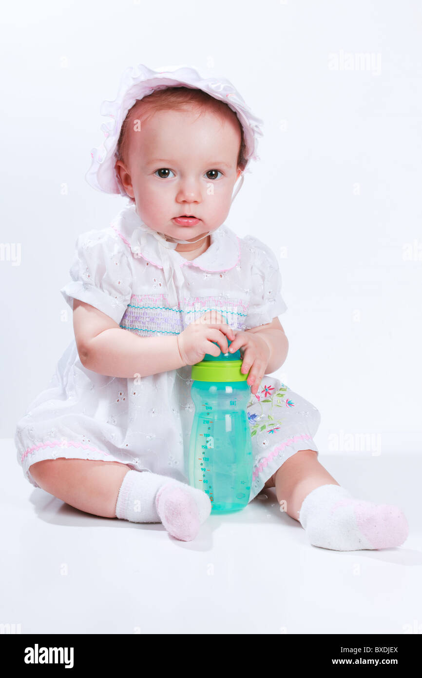 Baby in studio against a white background Stock Photo - Alamy