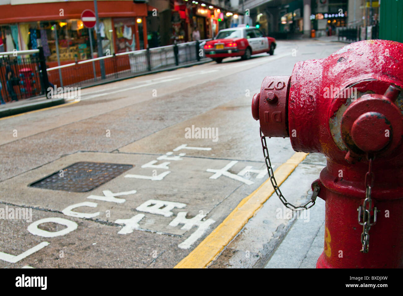 Road side fire hydrant on Hong Kong Island, China. Close detail of red ...