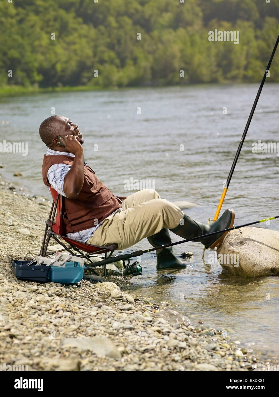 Black man cell phone fishing hi-res stock photography and images - Alamy