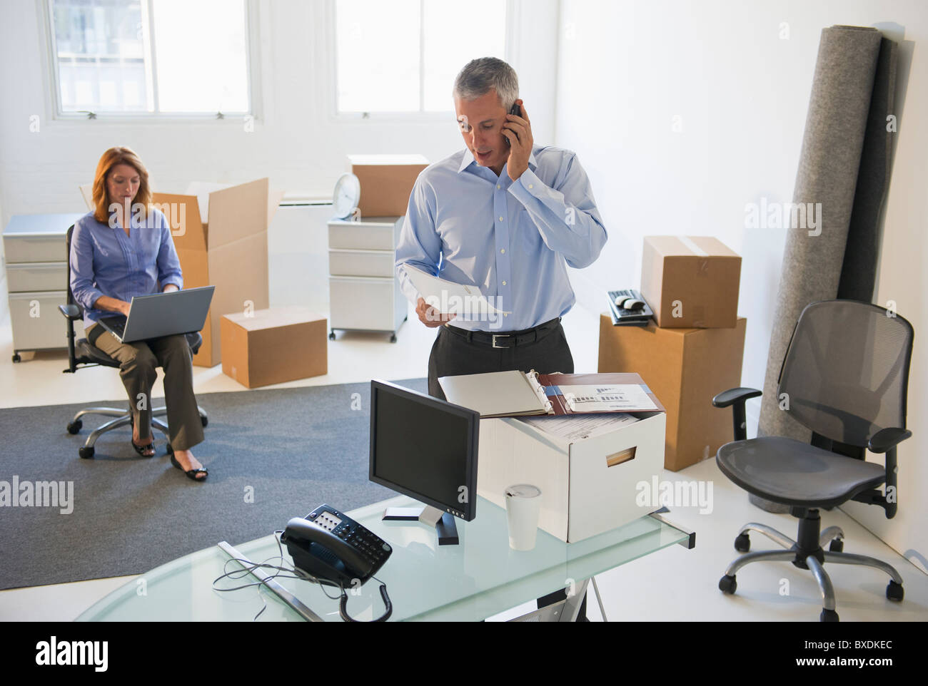 Business entrepreneurs working in startup office Stock Photo - Alamy