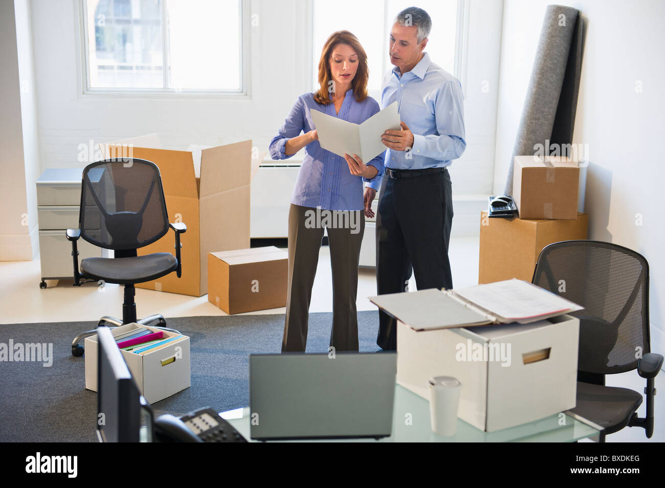 Business entrepreneurs working in startup office Stock Photo - Alamy
