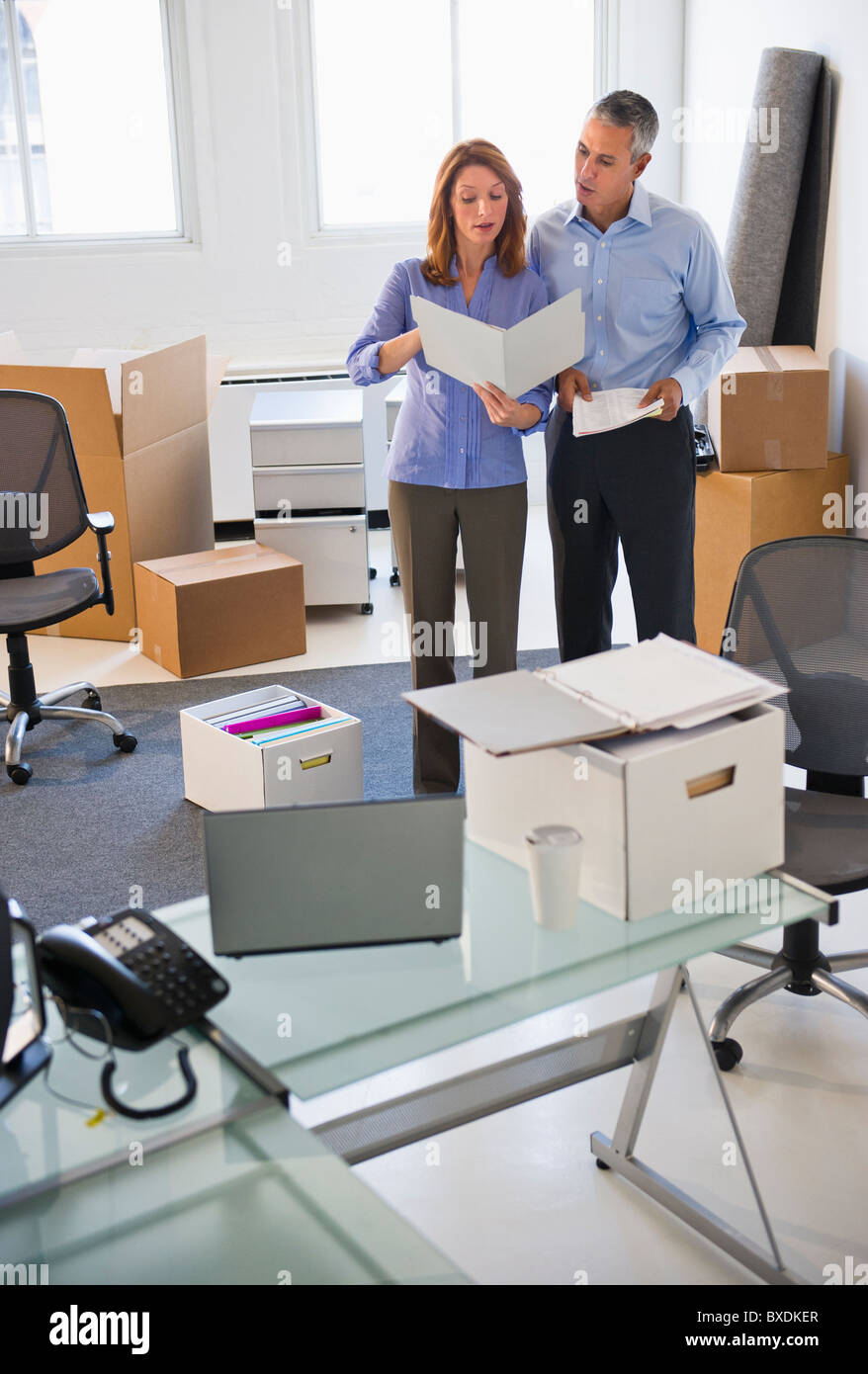 Business entrepreneurs working in startup office Stock Photo - Alamy