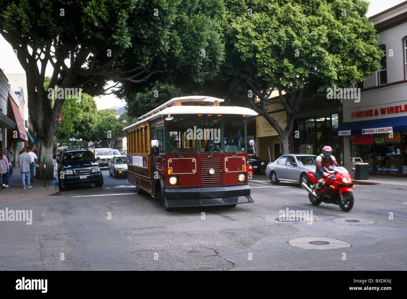 A shuttle trolley travels in downtown San Luis Obispo, CA Stock Photo ...