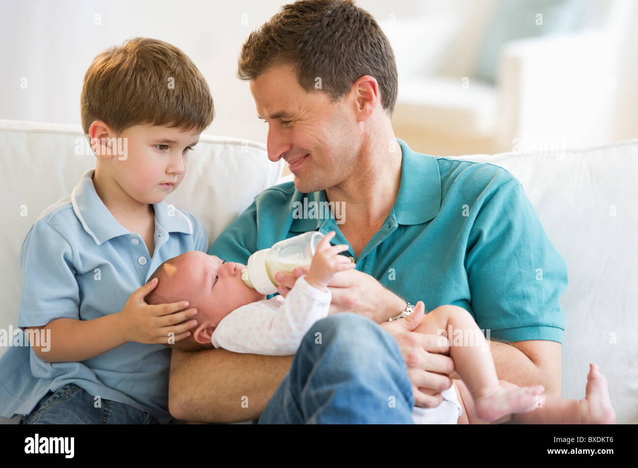 Father and his two sons Stock Photo - Alamy