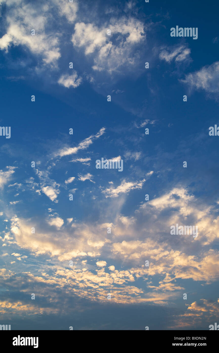 Clouds in blue sky at dusk Stock Photo - Alamy