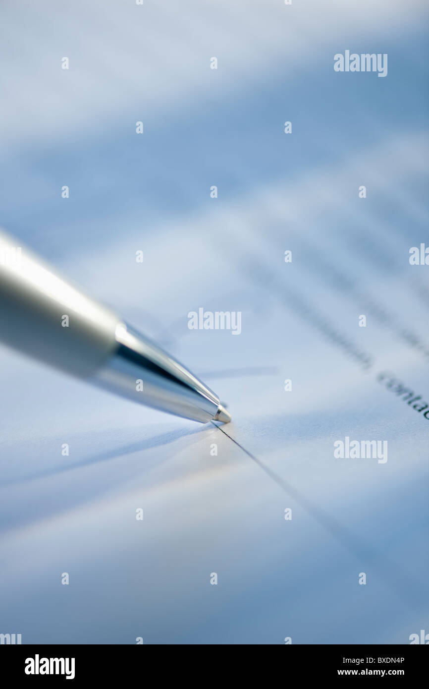 Pen and legal document Stock Photo - Alamy