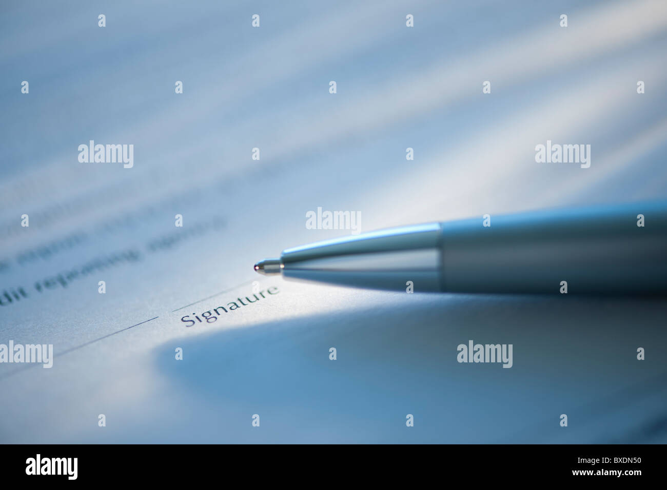 Pen and signature line Stock Photo - Alamy