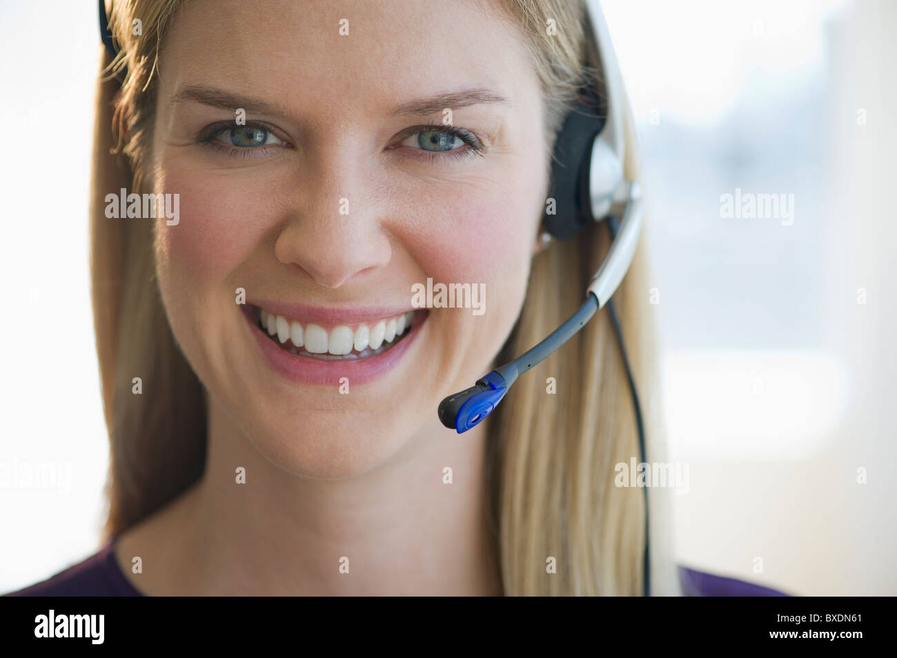 Portrait of customer service person with head phones hi-res stock ...