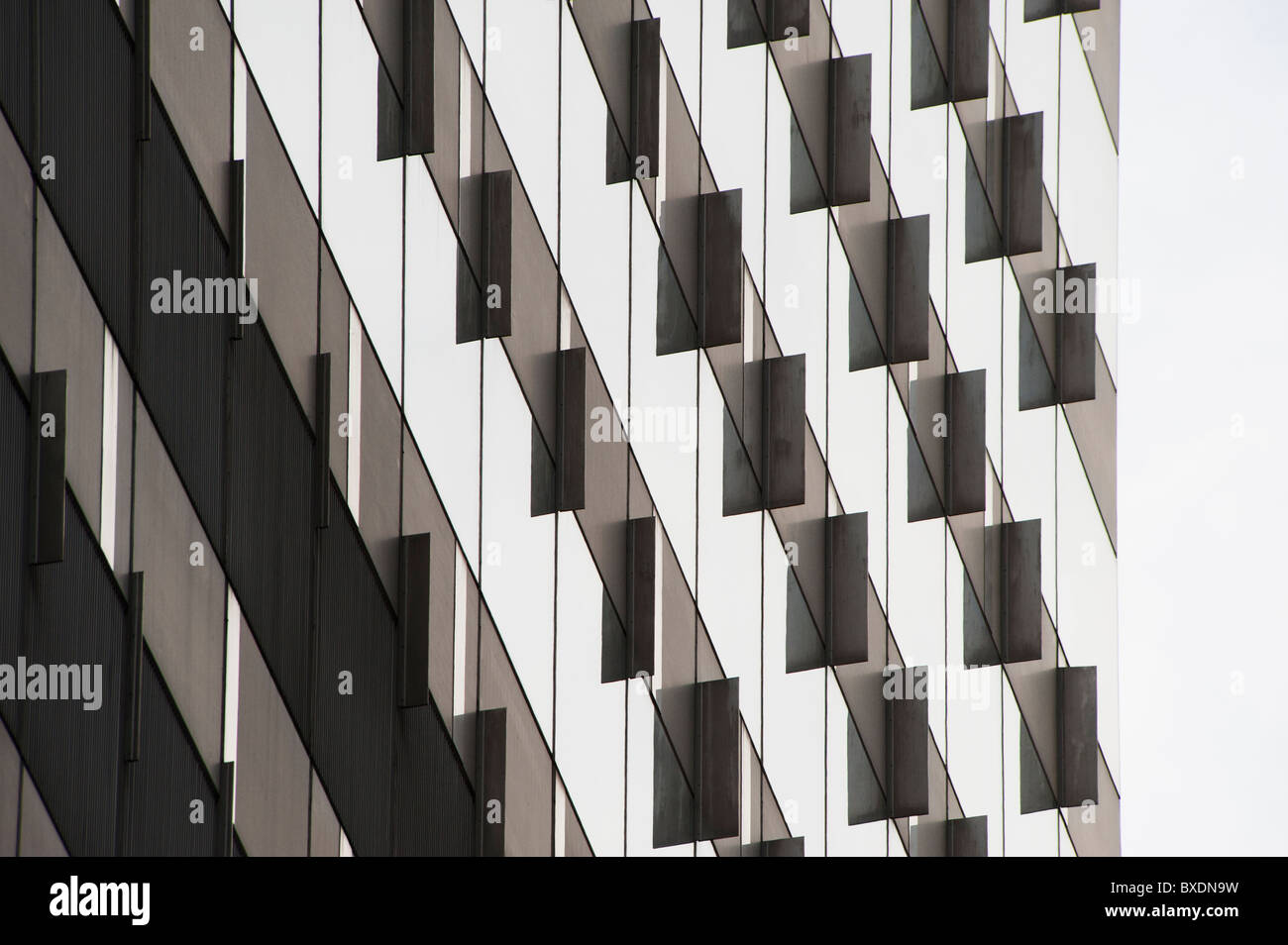 Windows on high-rise building Stock Photo - Alamy