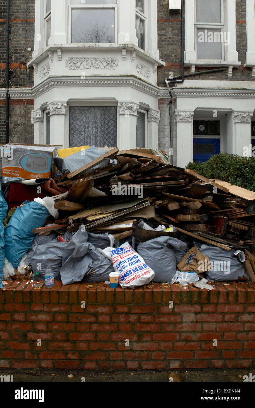 Pile of rubbish outside house hi-res stock photography and images - Alamy