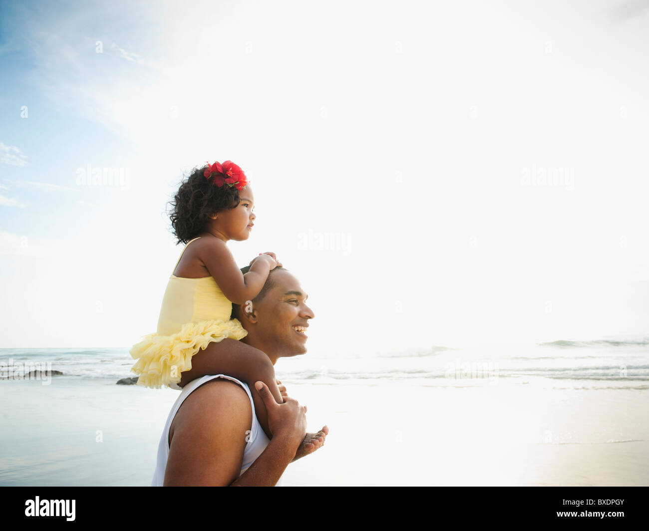 Black father carrying daughter on hi-res stock photography and images - Alamy