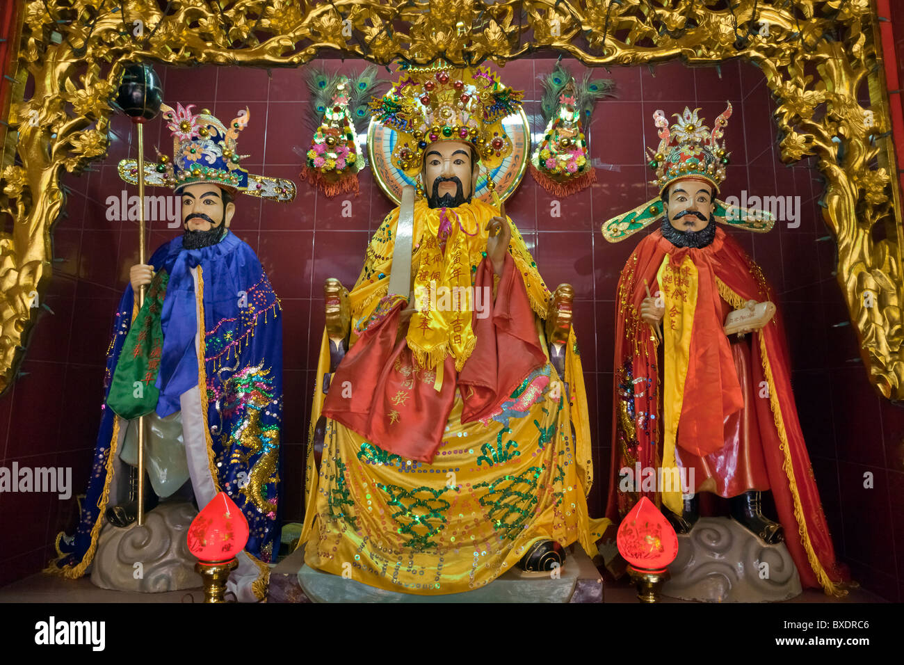 Ornate statues in Vietnamese temple Stock Photo - Alamy
