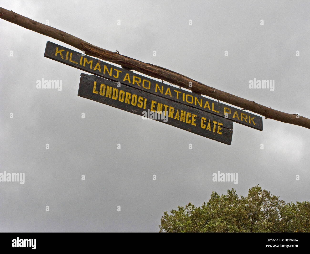 Sign over the road welcomes visitors to Kilimanjaro National Park Stock ...