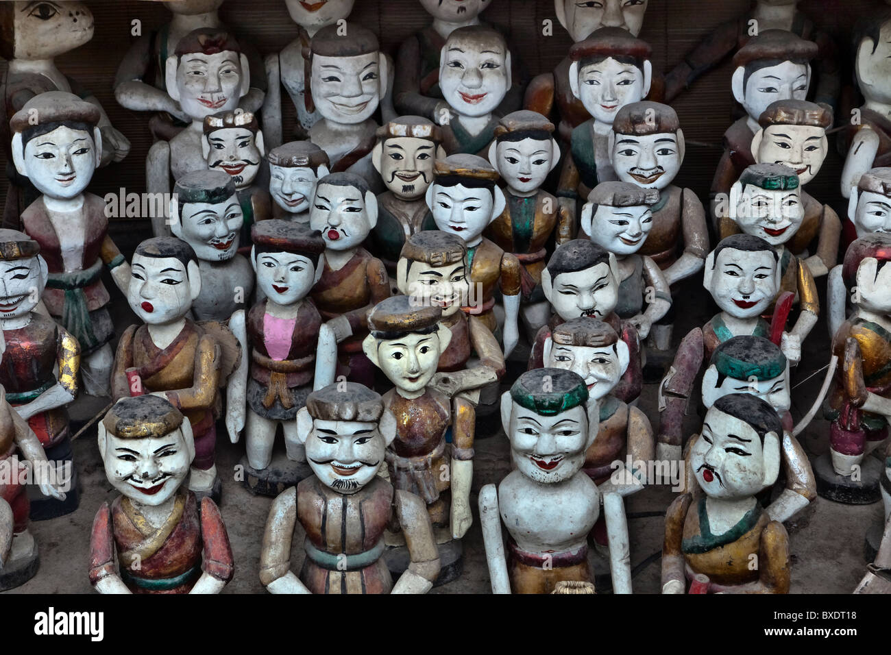 Rows of Vietnamese puppet figures Stock Photo - Alamy
