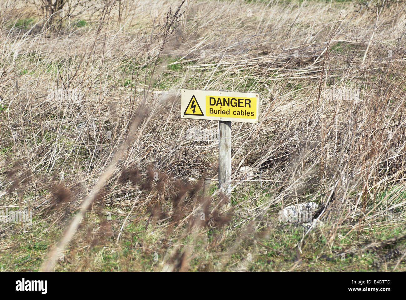 Warning sign regarding buried utility cables Kings Lynn Norfolk UK ...