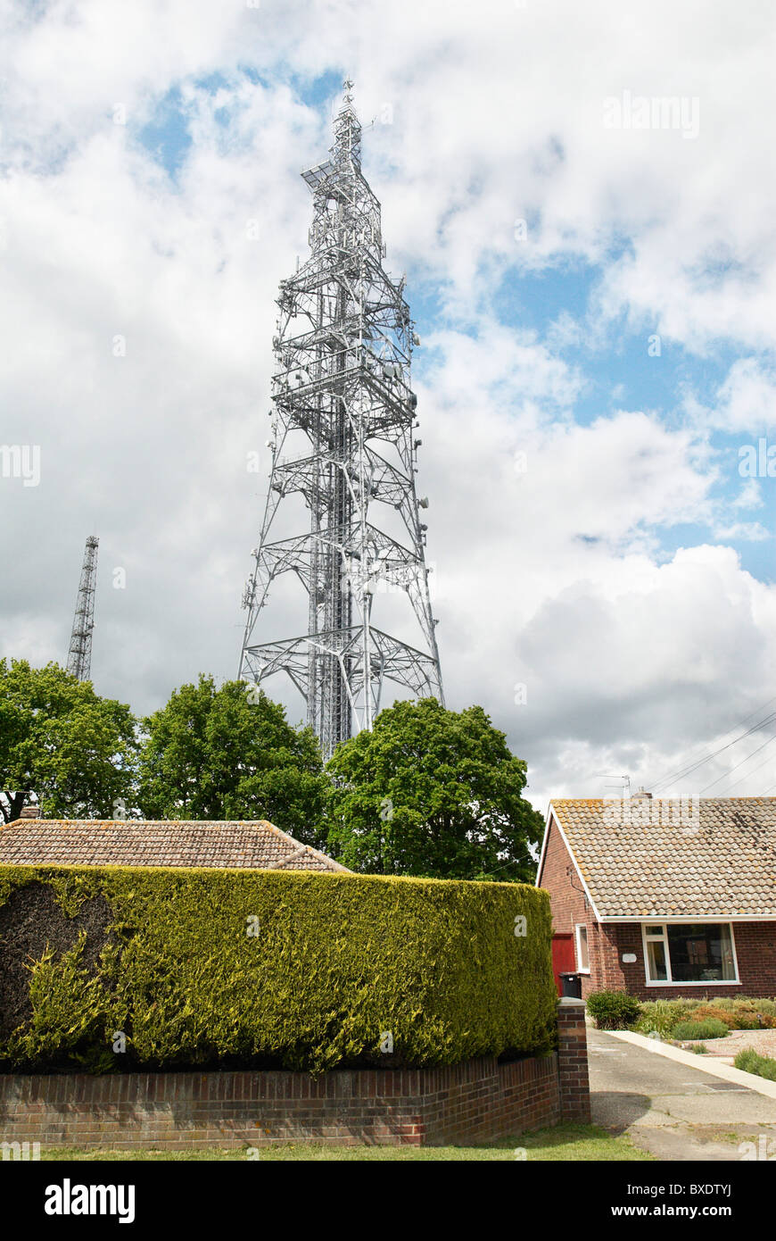 Giant radio mast tower near housing Norfolk UK Stock Photo - Alamy