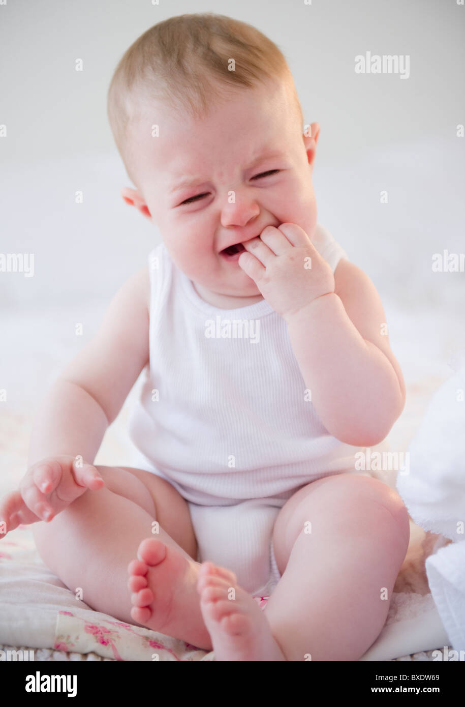 Baby teething and crying hi-res stock photography and images - Alamy
