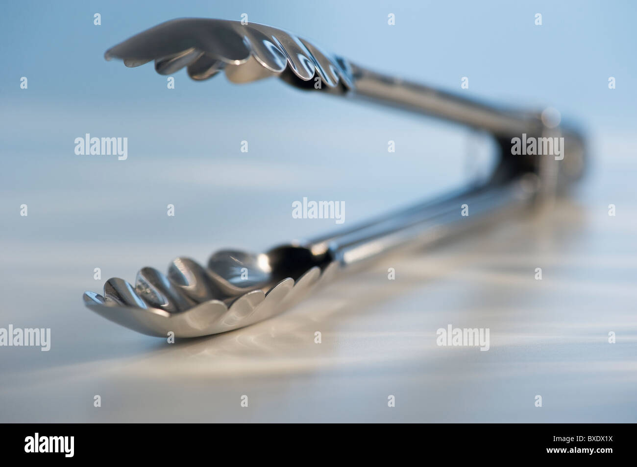 Metal tong hi-res stock photography and images - Alamy