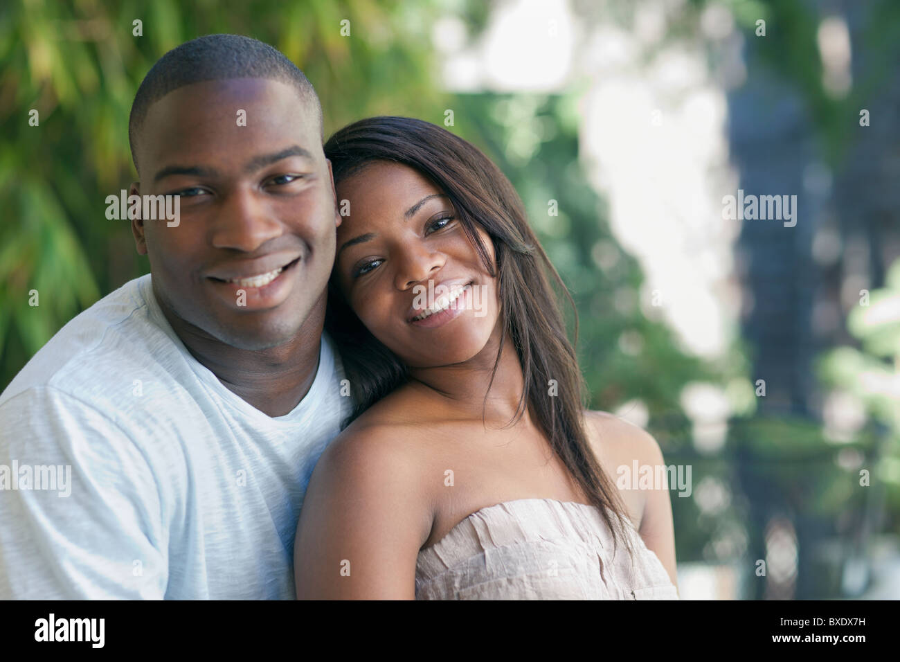 Black couple hugging outdoors Stock Photo - Alamy