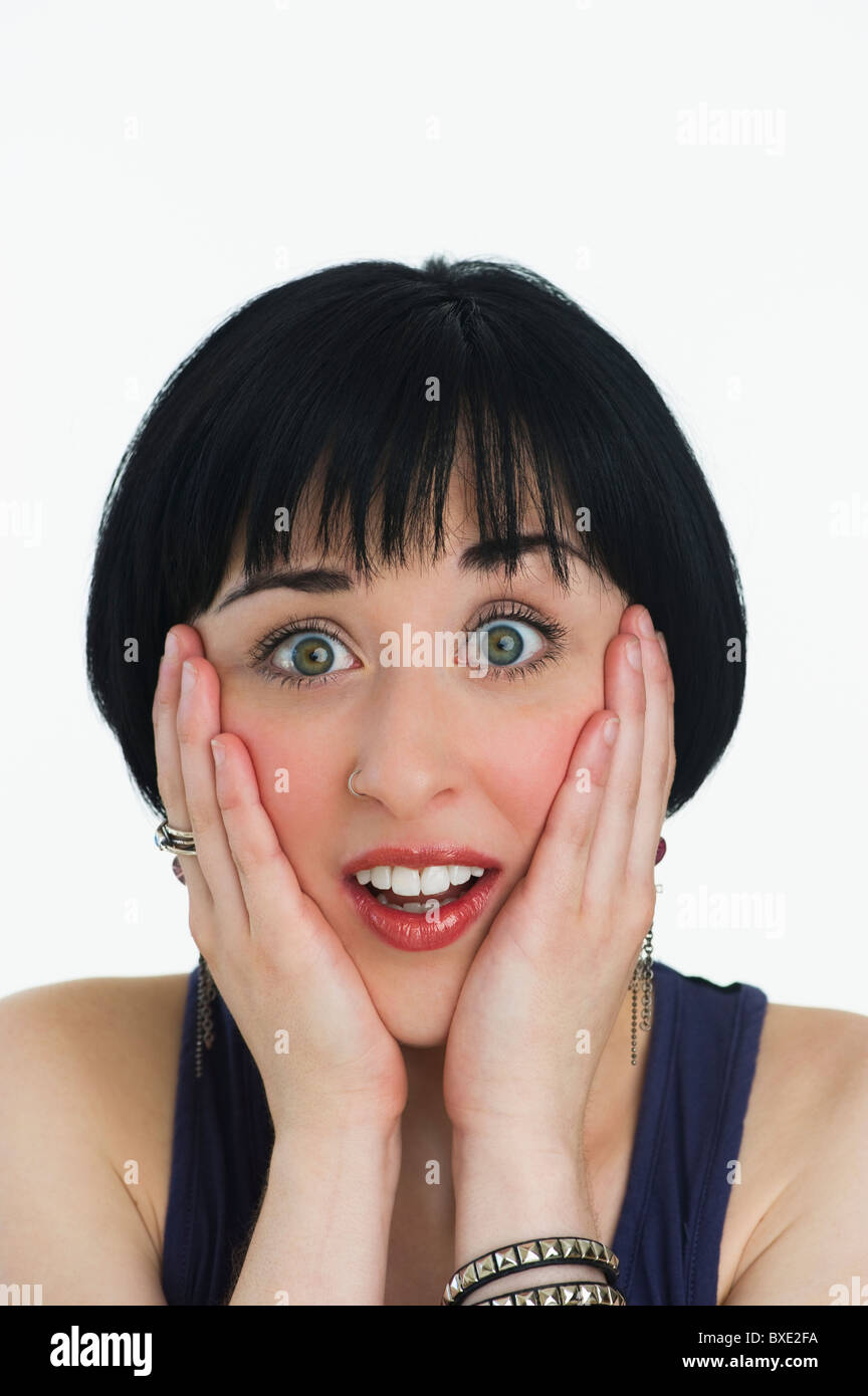 Shocked young woman facing hi-res stock photography and images - Alamy