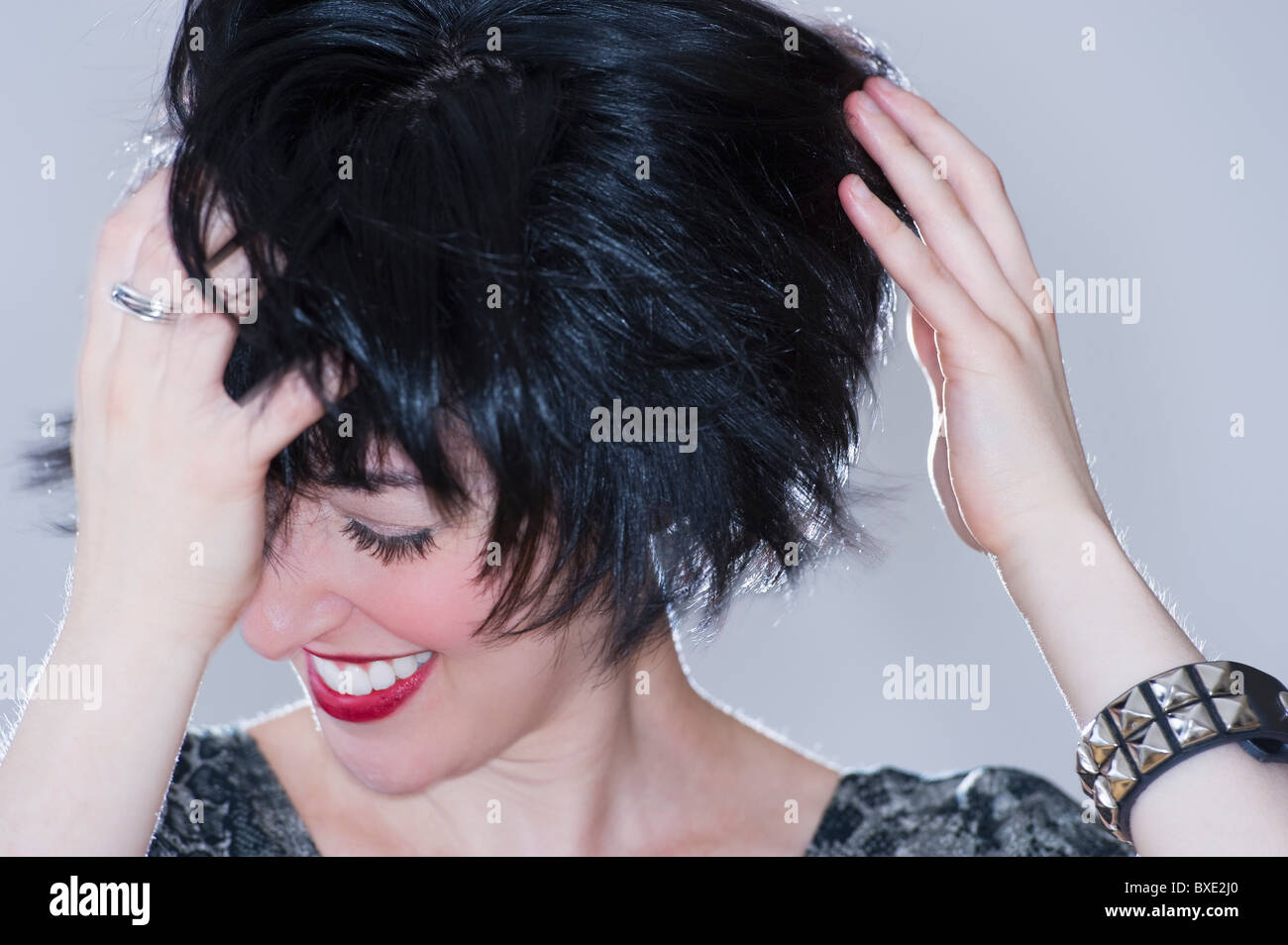 Woman flowing hair smiles hi-res stock photography and images - Alamy