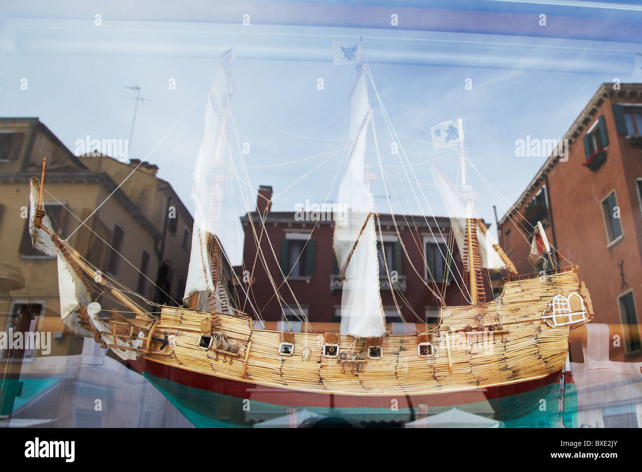 Wooden ship model behind glass Stock Photo - Alamy
