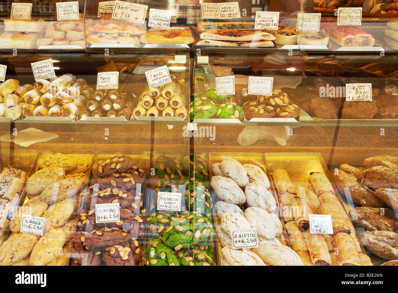 Variety of cookies in display case Stock Photo - Alamy