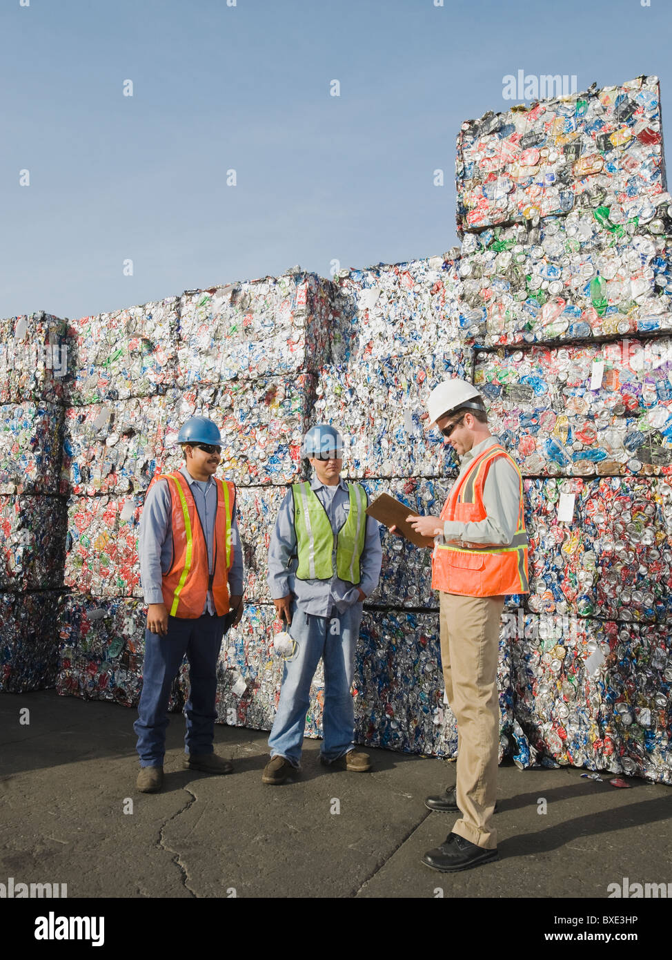 Workers at recycling plant Stock Photo - Alamy