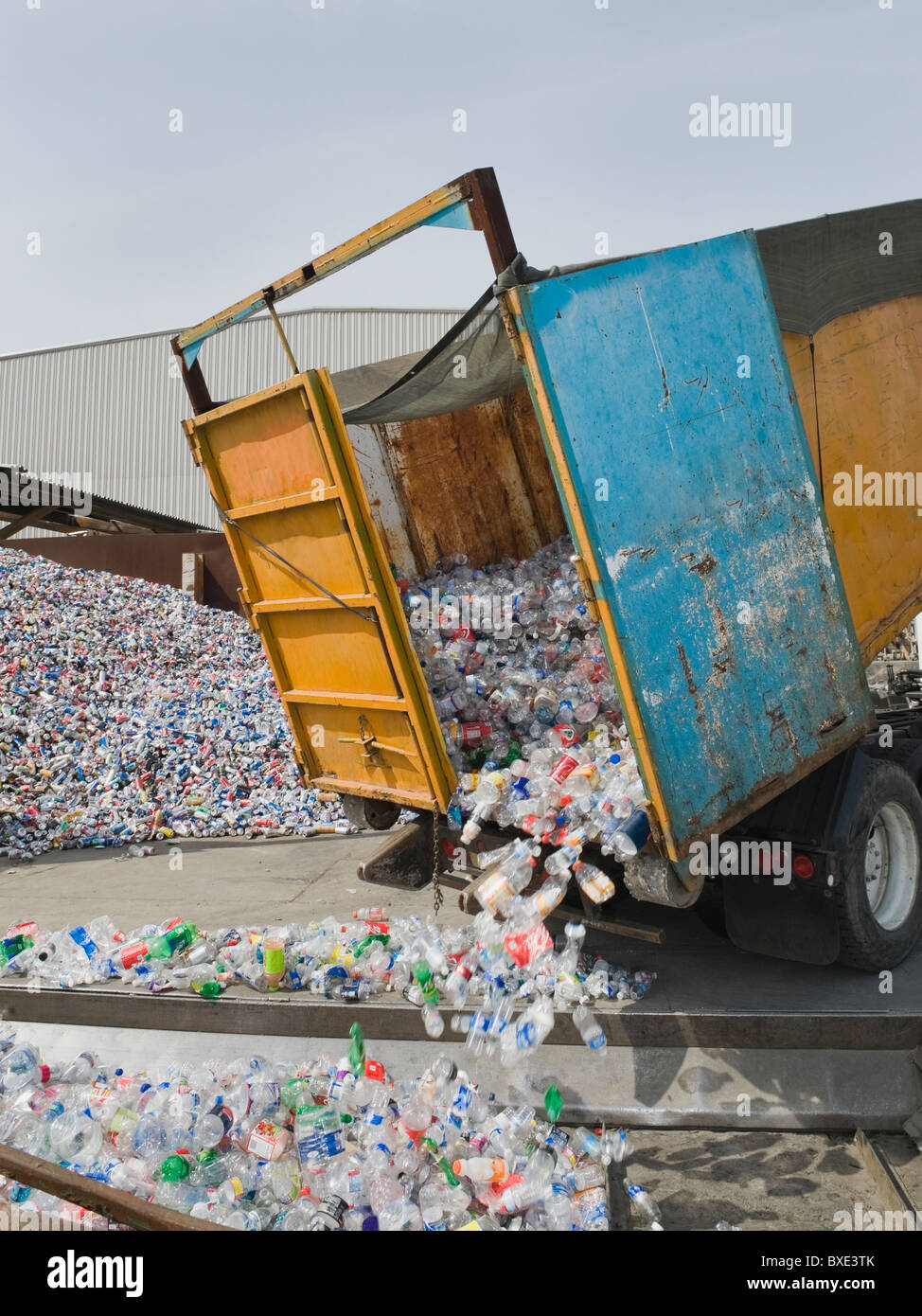 Recycle truck dumping out plastic bottles Stock Photo - Alamy